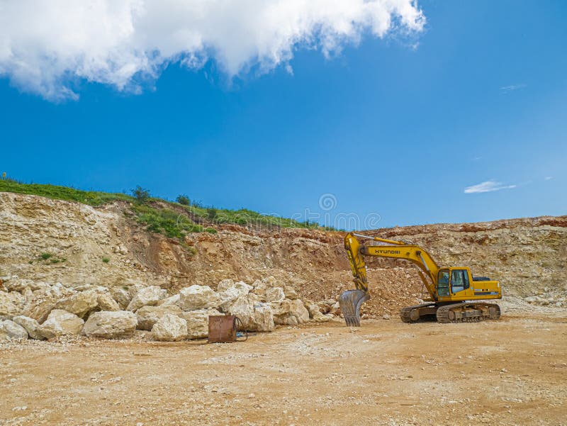 Limestone Stone Quary and an Excavator. Editorial Photo - Image of ...