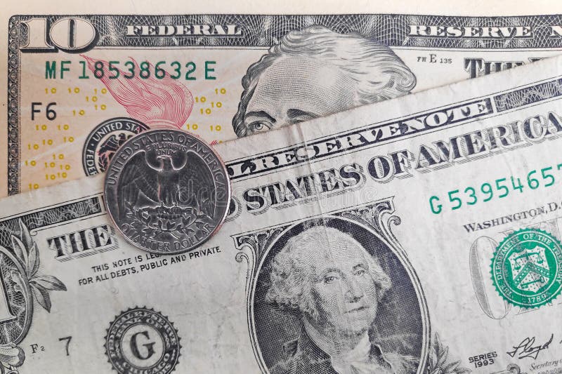 Quarter Dollar Coin on Top of a Banknote of 1 and 10 Stock Photo ...
