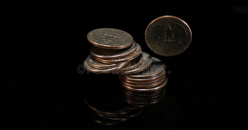 Quarter Dollar Coins Falling, Rolling and Sliding on Black Background ...