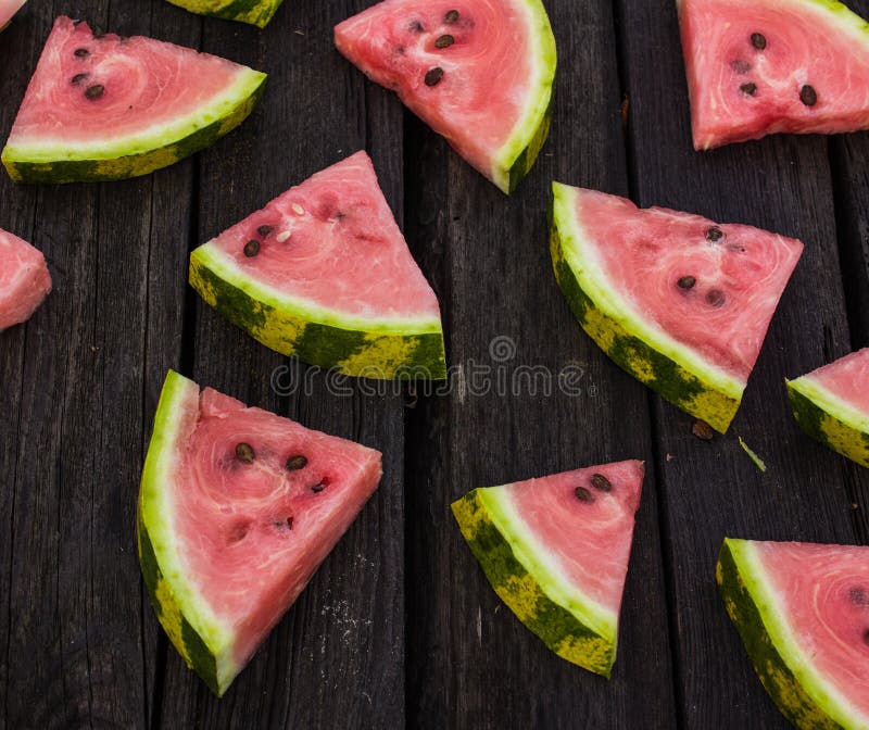 A Quarter of a Watermelon on a Wooden Table. Two Watermelons. Summer ...