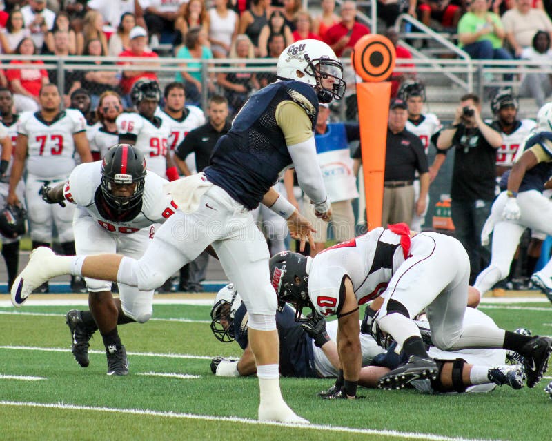 Quarterback Completes a Pass. Editorial Stock Photo - Image of sports ...