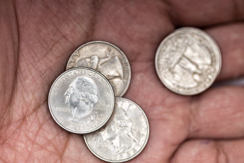 Quarters in Hand stock image. Image of bank, city, business - 76064303
