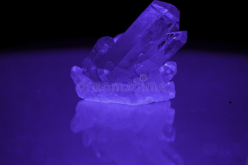 Quartz with Mineral Crystals Against a Black Background Stock Photo ...