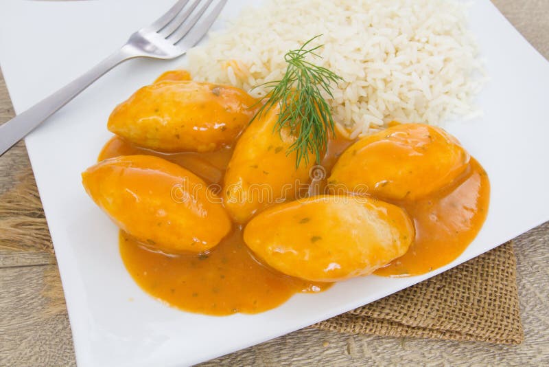 Pike Quenelles with Nantua Sauce and Rice Stock Image - Image of fish ...