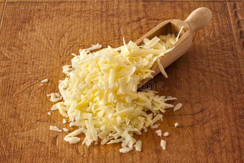 Queso rallado imagen de archivo. Imagen de cucharada - 43066735
