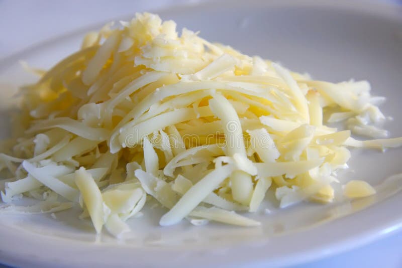 Queso rallado imagen de archivo. Imagen de amarillo, blanco - 9263927