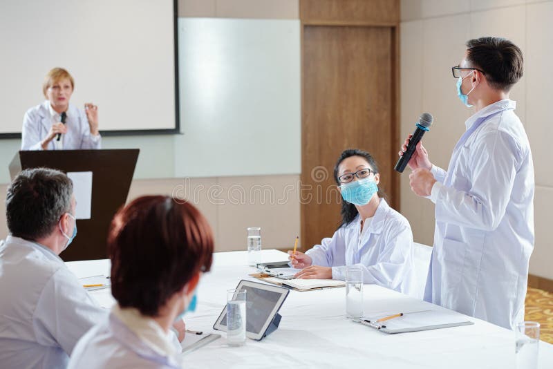 Question from the audience stock photo. Image of presentation - 207792952