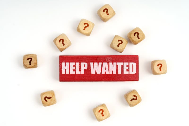 On the Table are Cubes with Questions and a Red Plaque with the ...