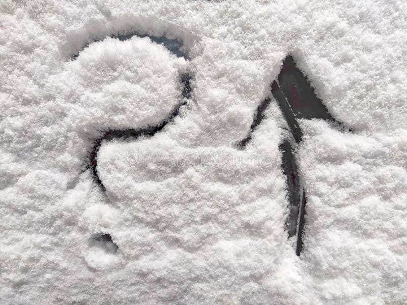 A Question Mark and Arrow Written in the Snow. the Cold Frosty Texture ...