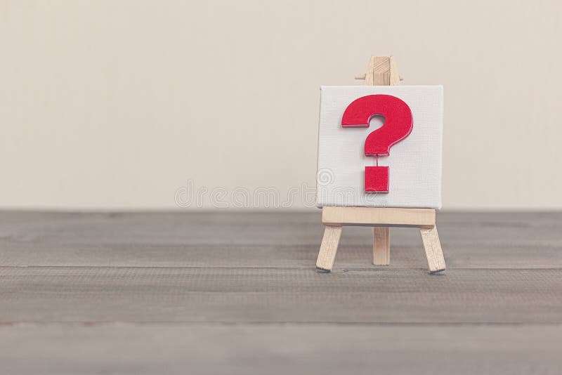 Question Mark with Blank Art Board on Wood Table , Problem Concept ...