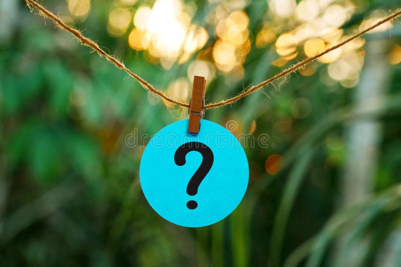 A Question Mark in Blue Paper Stuck Hanging from a String Stock Photo ...