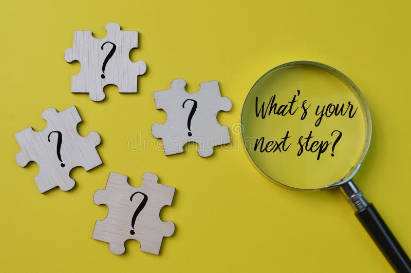 Question Mark Drawn on Wooden Jigsaw Puzzle with Text WHAT`S YOUR NEXT ...