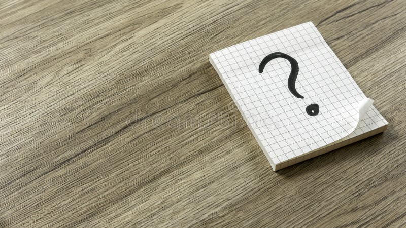 Question Mark on Graph Paper Notepad on Wooden Surface Stock Image ...