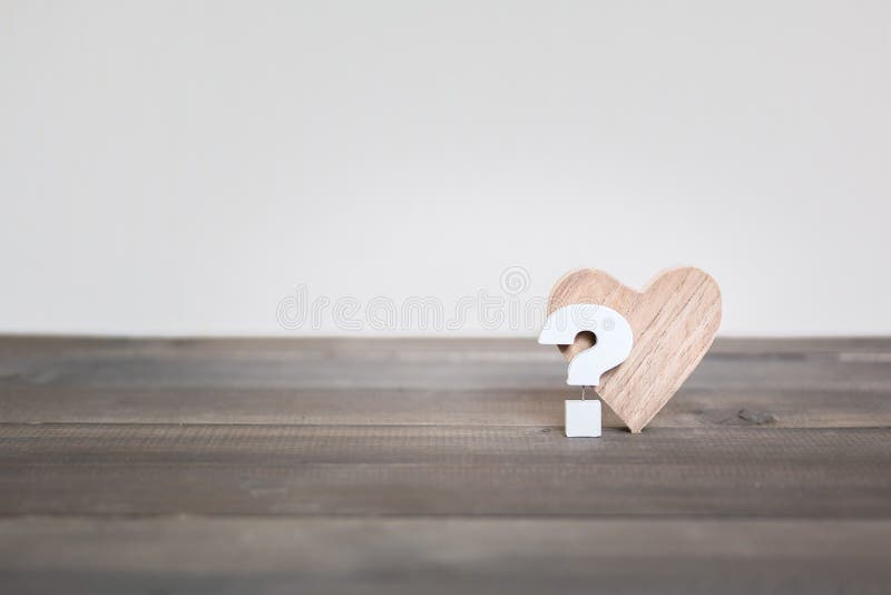 Question Mark with Heard on Wood Table , Problem Concept Stock Photo ...
