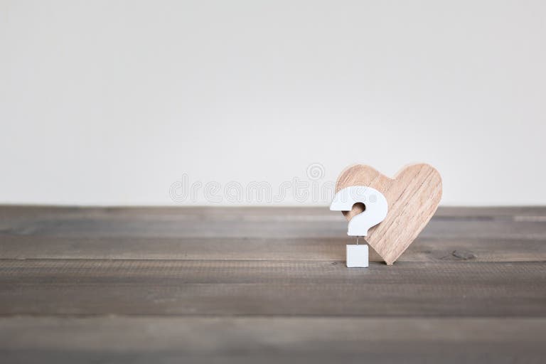 Question Mark with Heard on Wood Table , Problem Concept Stock Photo ...