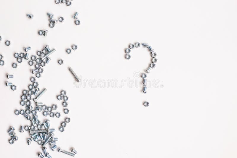 Question Mark Lined with Bolts and Nuts on a White Background. Question ...