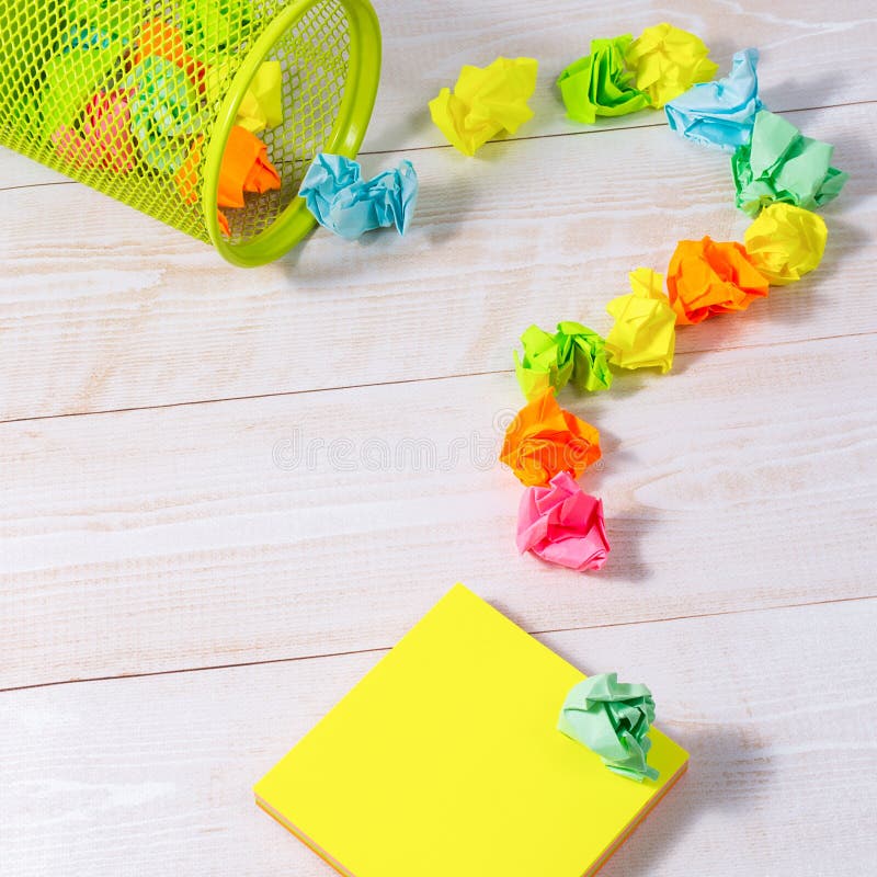 Question Mark Made of Crumpled Note Paper on a Wooden Writing Table ...