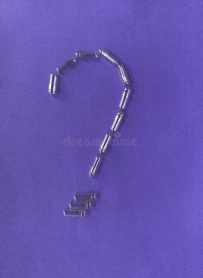 Question Mark Made of Empty Pill Capsules on a Lilac Background. Stock ...