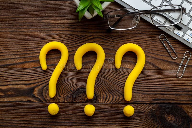 Question Mark Signs on Office Table. Customer Support Servise or FAQ ...