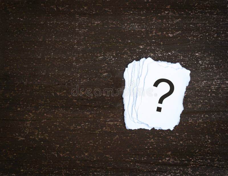 Question Mark Stack of Torn Papers on Grunge Wood Table Stock Photo ...