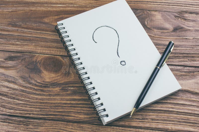 Question Mark Written on a Notebook Stock Photo - Image of confusion ...