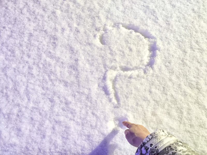A Question Mark Written in the Snow and Hand. the Cold Frosty Texture ...