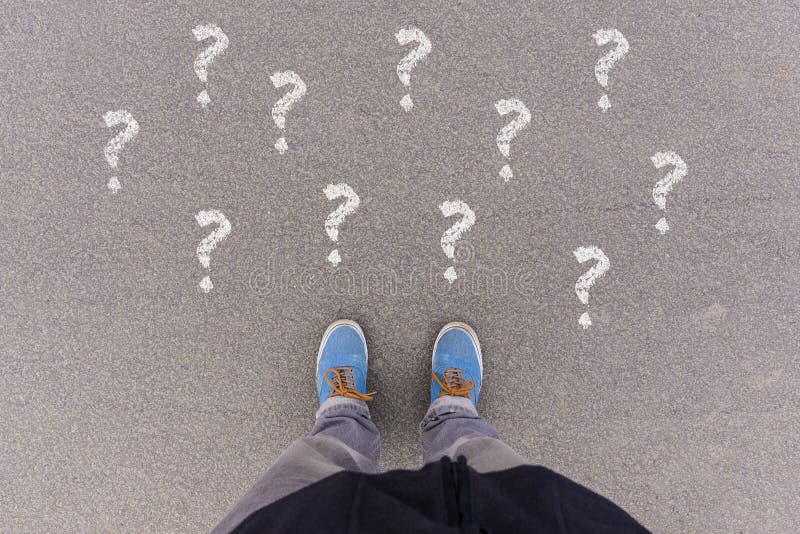 Question Marks on Asphalt Ground, Feet and Shoes on Floor Stock Photo ...