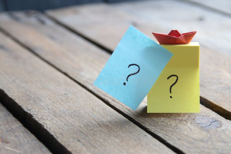 Question Marks on Cards on a Wooden Background Stock Image - Image of ...