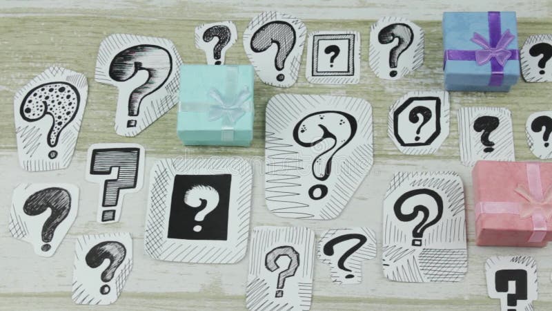 Question Marks and Color Gift Boxes Stock Footage - Video of interest ...