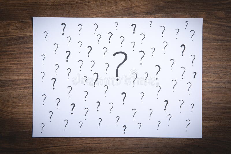 Question Marks on Paper on the Wooden Table Stock Photo - Image of ...