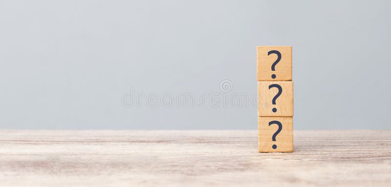 Question Marks on the Table Written in a Row on Cubes. Frequently Asked ...