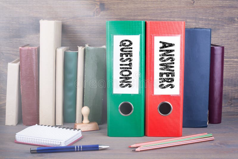 Questions And Answers. Signpost On Wooden Table Stock Photo - Image of ...