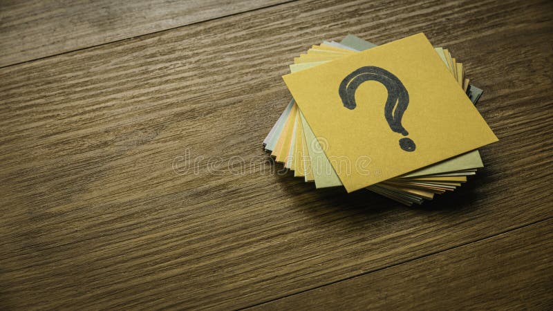 Questions and Answers Concept. a Stack of Paper with a Paper on Top ...