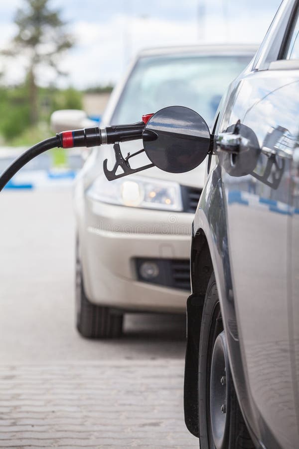 Queue of Cars at a Petrol Station Stock Photo - Image of automobile ...