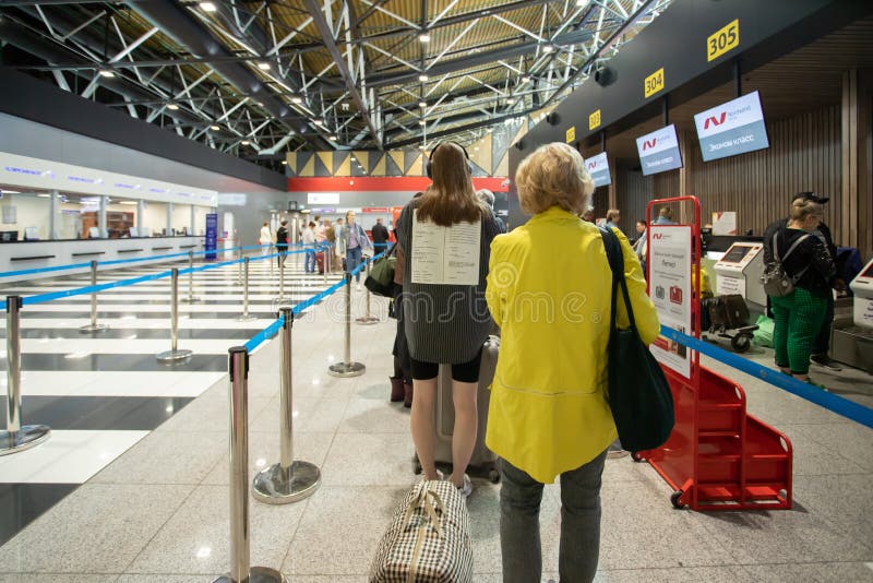 Queue of Passengers at the Airport Check-in Counters, Russia, Moscow ...