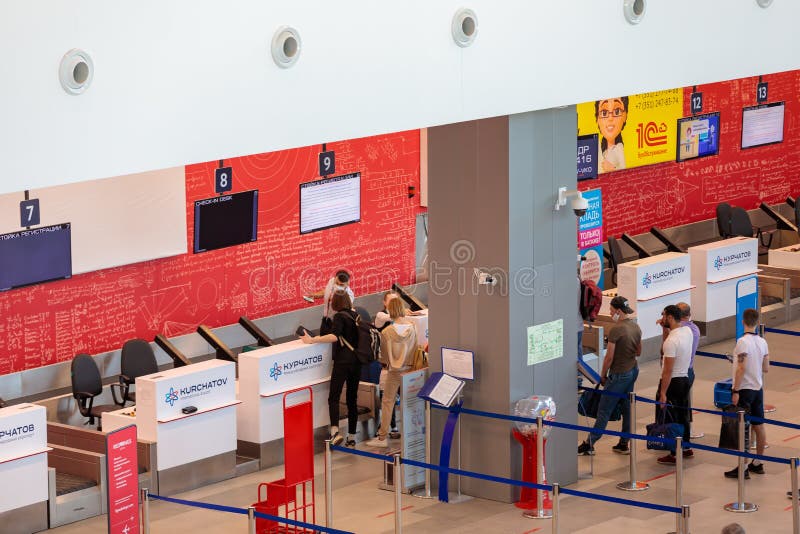 The Queue of People at the Airport is at the Check-in Counter Editorial ...