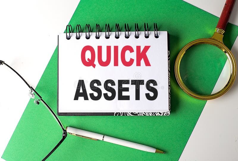 QUICK ASSETS Text on Notebook on Green Paper Stock Photo - Image of ...