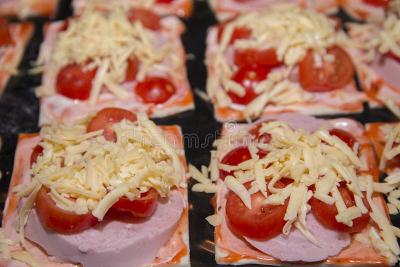 Quick Mini Pizzas Ready for Baking. Stock Photo - Image of puny, puff ...
