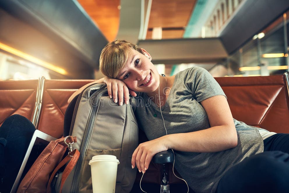 Quick Nap before the Next Flight. a Young Woman Resting before Her Flight. Stock Photo - Image ...