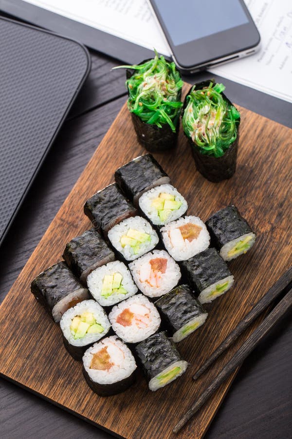 Quick Sushi Lunch in the Office Stock Photo - Image of desk, style ...