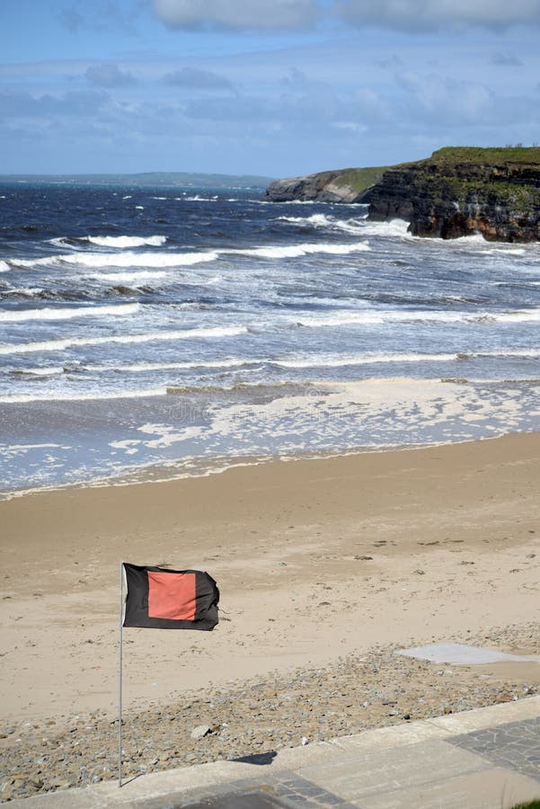 Quicksilver Flag Flying beside Ballybunion Beach Stock Photo - Image of ...