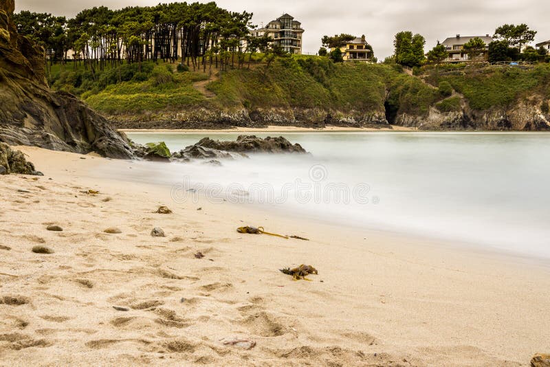 Quiet beach in Asturias stock photo. Image of vegetation - 59313220
