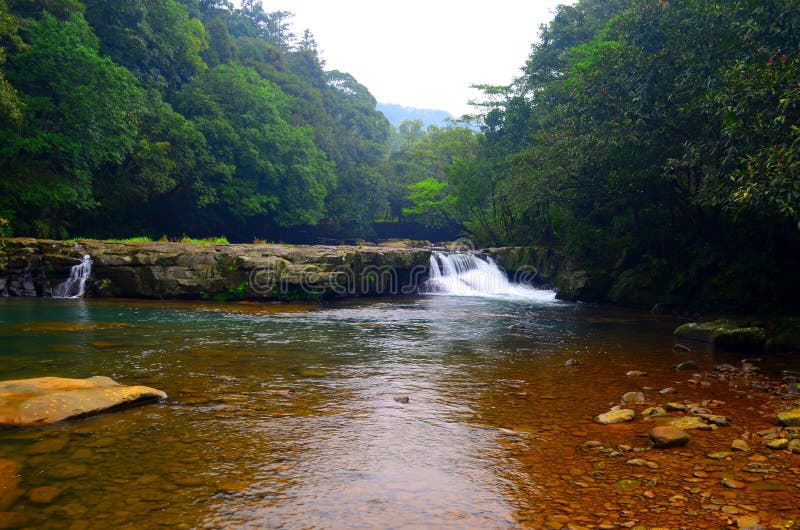 Quiet and Calm Waterfall and Lake in the Forest Stock Photo - Image of ...