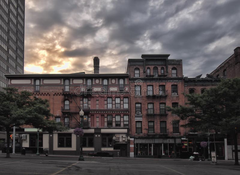 Quiet City Street at Sunrise Stock Photo - Image of financial, asphalt ...