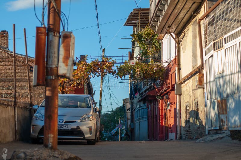 Quiet city under the sun editorial photo. Image of hood - 264820776