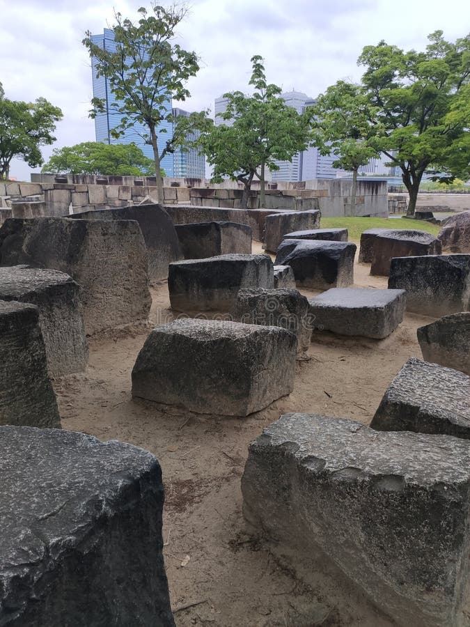 Remnants of Osaka Castle: Stone Blocks and Nature Against the Modern ...