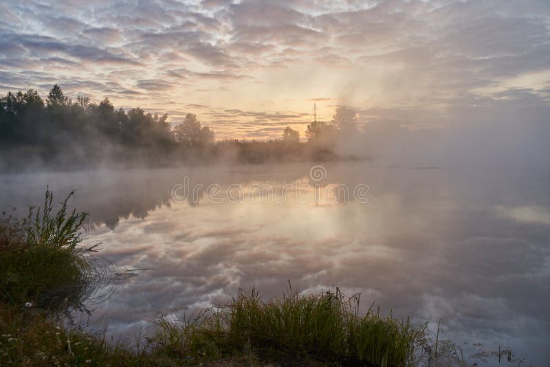 A Quiet Dawn Over the Lake in a Sunny Hazy Light. Stock Photo - Image ...