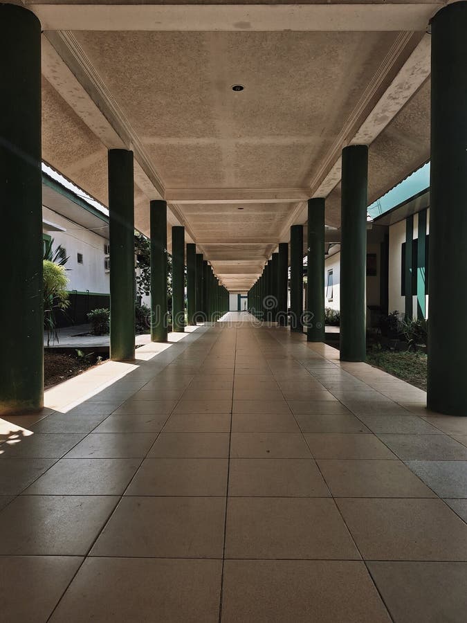 A quiet hospital hallway stock image. Image of lighting - 326599611