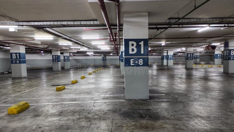 Quiet Mall Basement Parking Stock Photo - Image of metro, racetrack ...