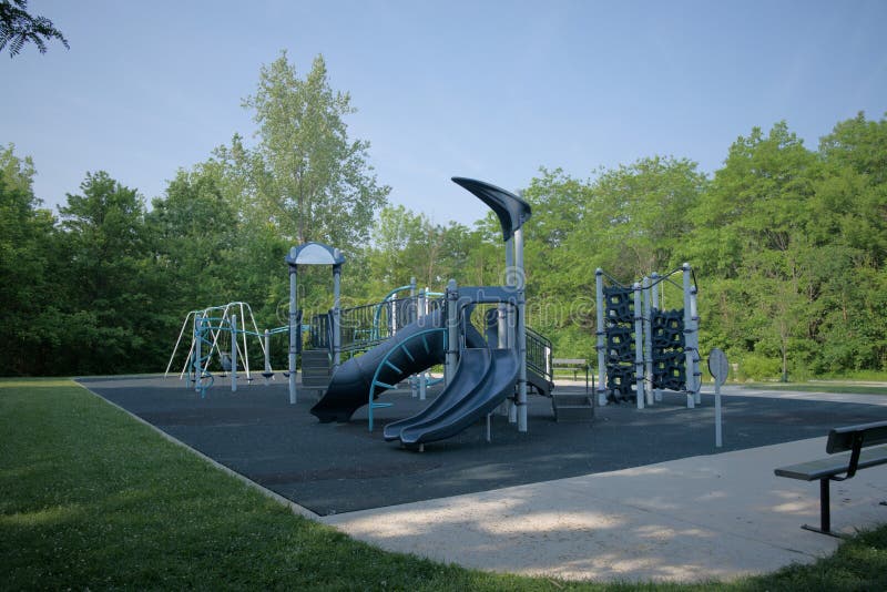 Quiet Morning at a Grey and Blue Playground Stock Image - Image of ...